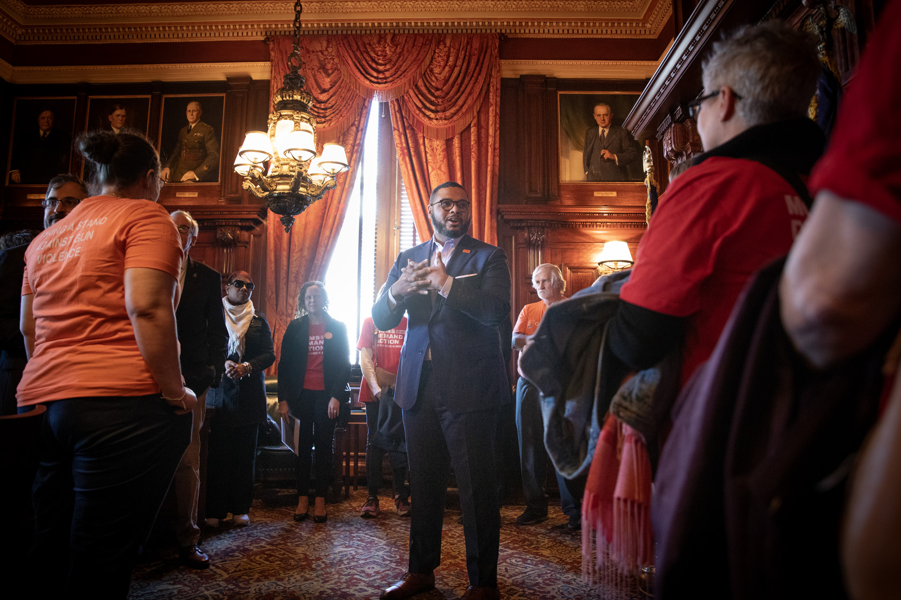 Lt. Gov. Austin Davis, gun safety advocates, and families of victims ...